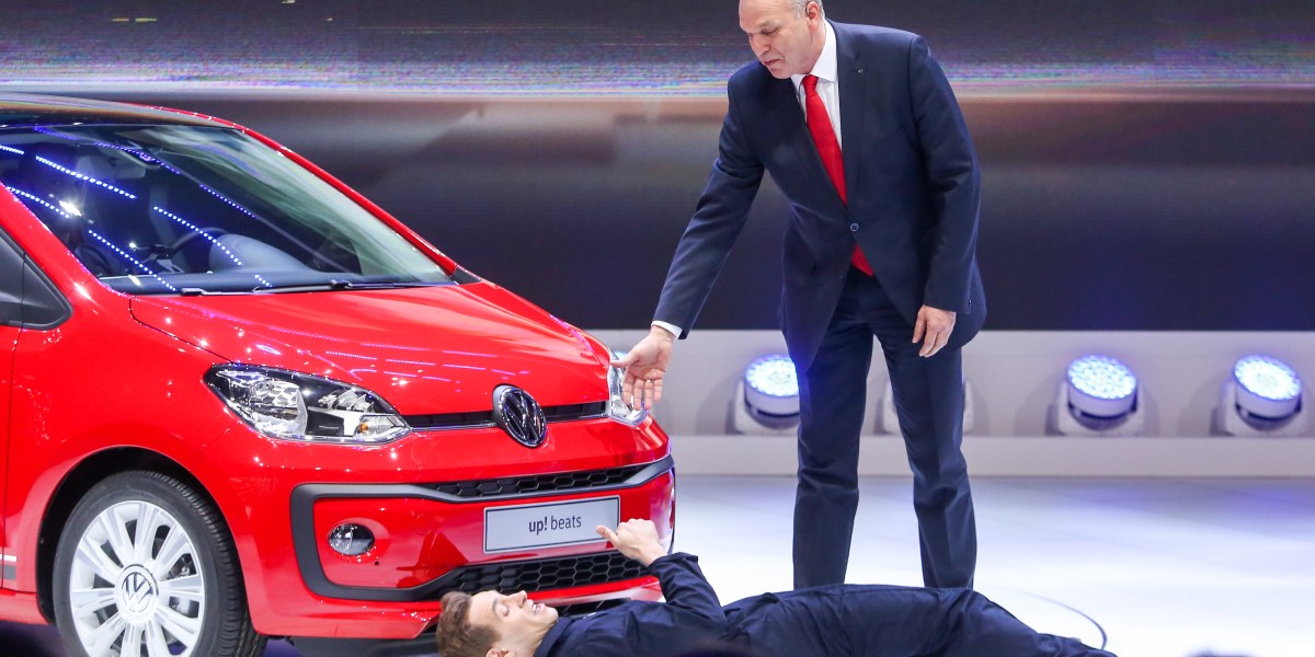 Protester Crashes Volkswagen's Press Conference at Geneva Auto Show ...
