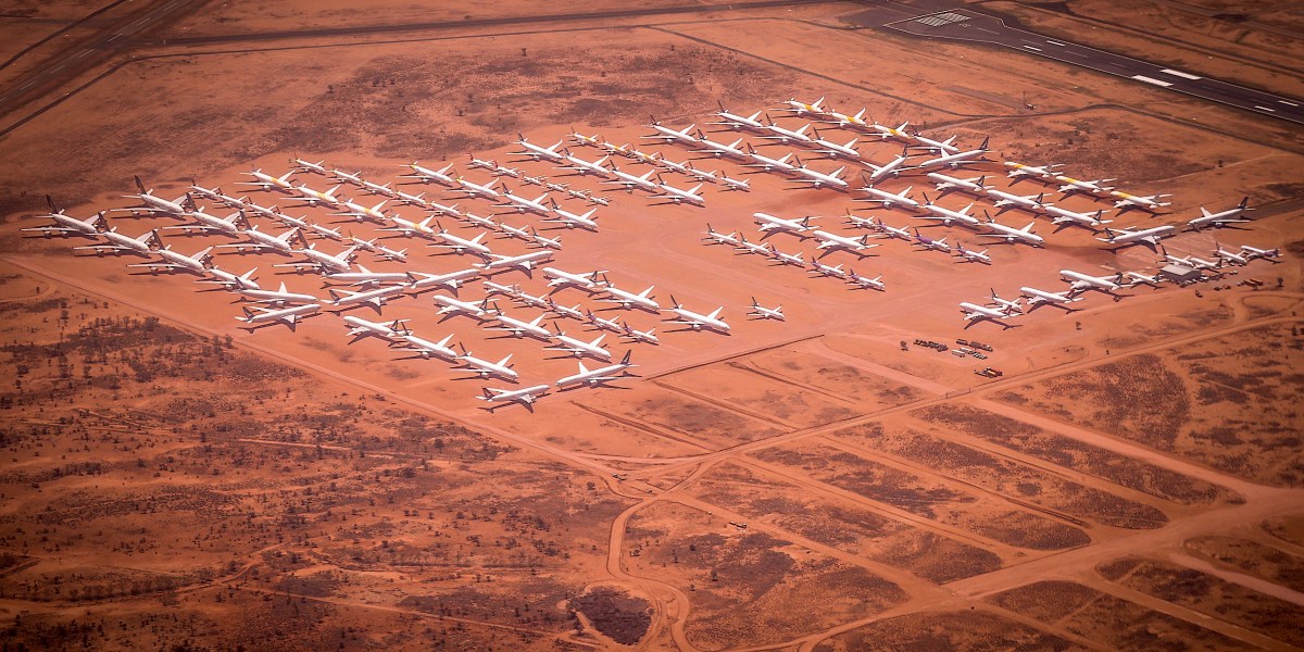The world's grounded jumbo jets sit in this desert parking lot in the ...