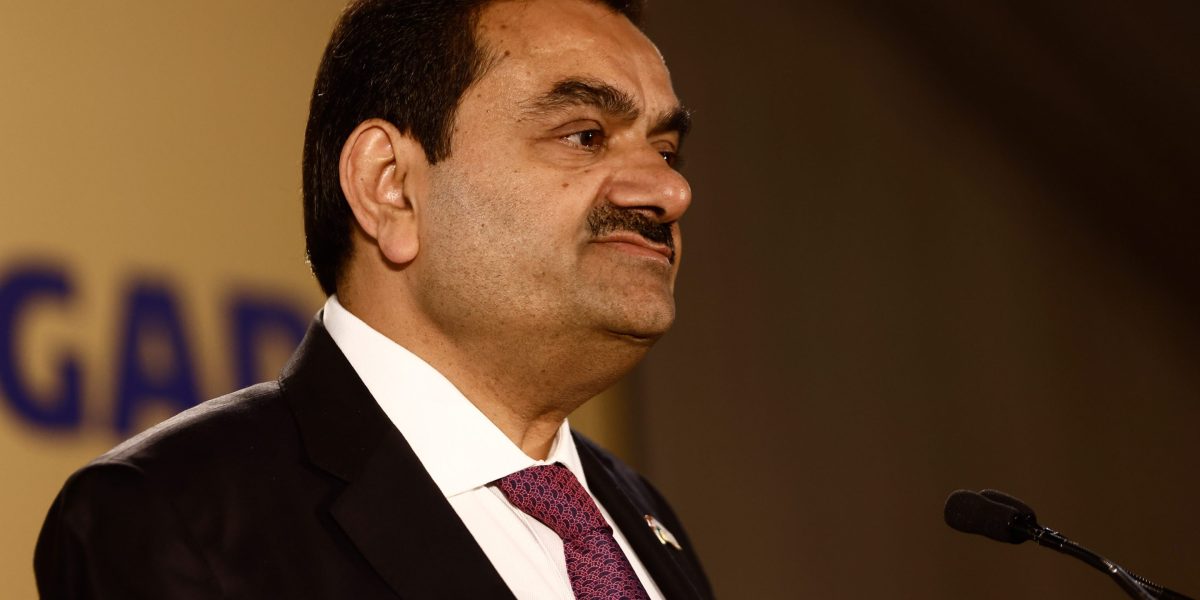 Adani halves growth target after attack by short seller Hindenburg ...