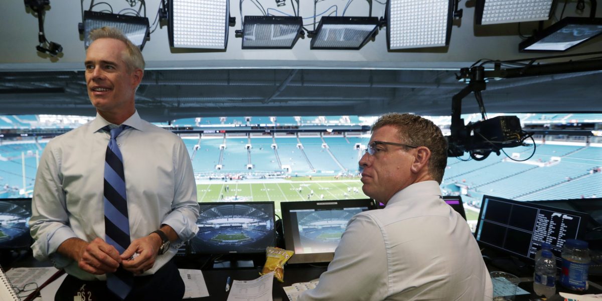 Football commentators Joe Buck and Troy Aikman pass Pat Summerall and ...