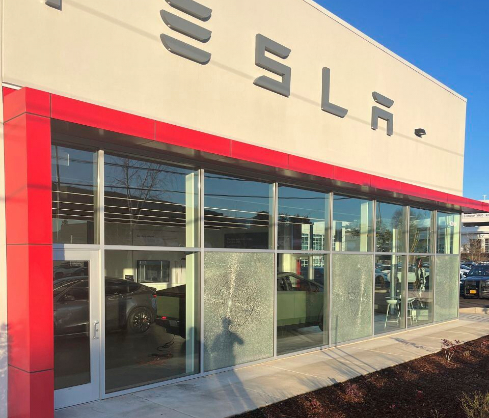 Police investigate latest anti-Tesla vandalism as dealership windows ...