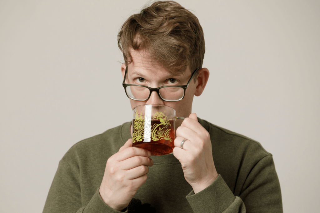 YouTuber Hank Green tells Gen Z to rethink their Tesla bets to avoid AI ...