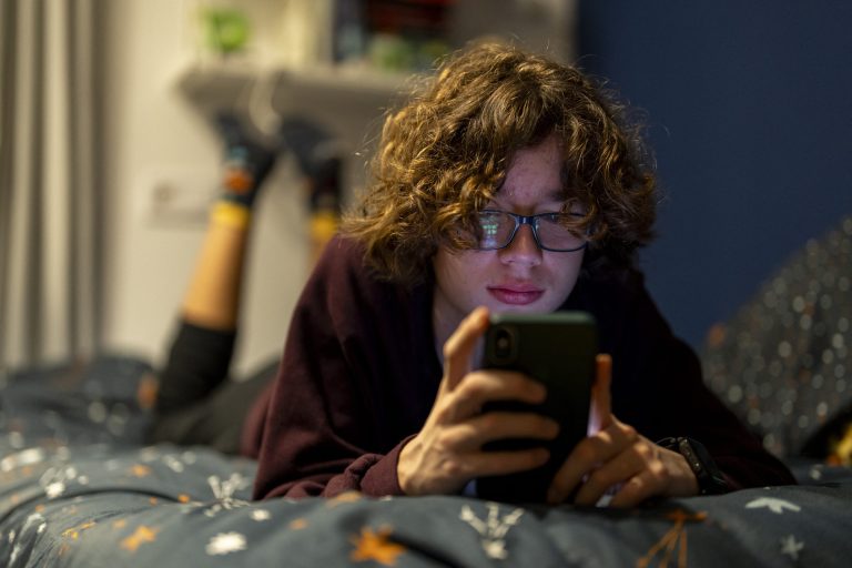 Australian teens say social media ban is futile and look to masks ...
